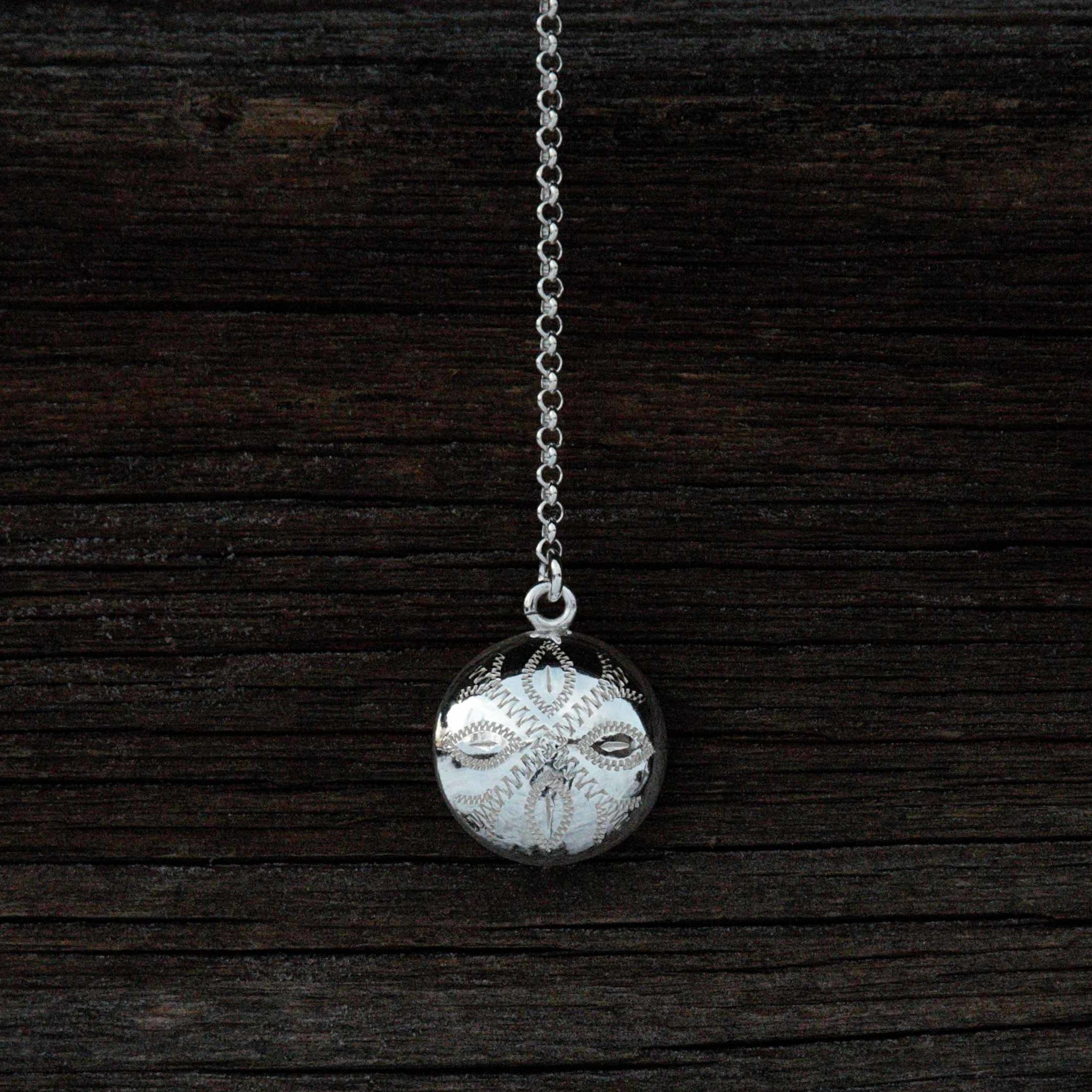 Belt end chain with a double-sided silver button 25 – Samekki
